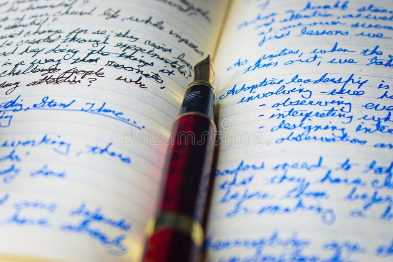 Fountain Pen in a Journal stock image. Image of office - 326386283