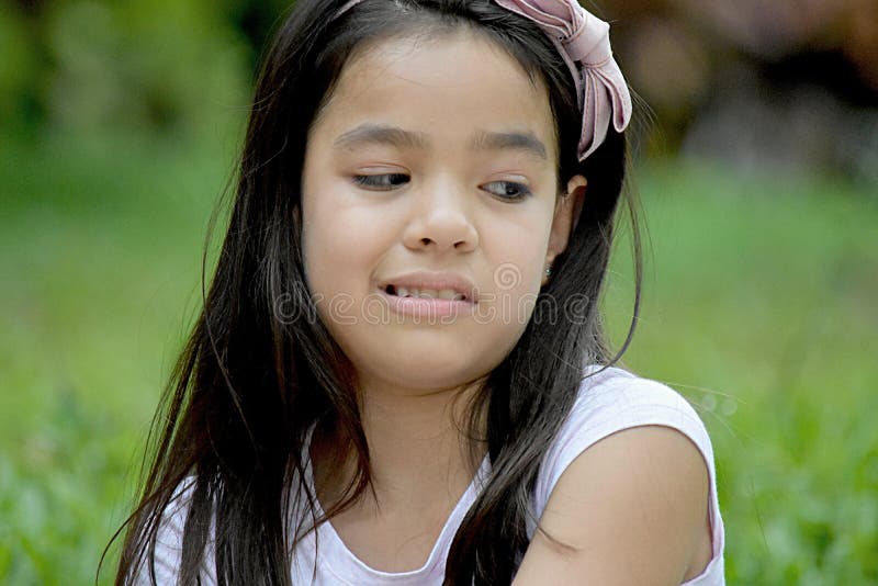 An Uncaring Asian Girl Child Stock Photo - Image of apathy, asian ...