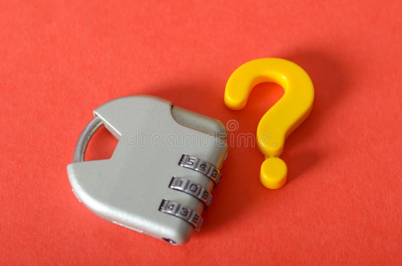 Uncertain Security: a Combination Lock Next To a Question Mark Stock ...