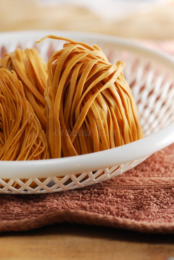 Uncook noodle coil stock photo. Image of micro, closeup - 20533872