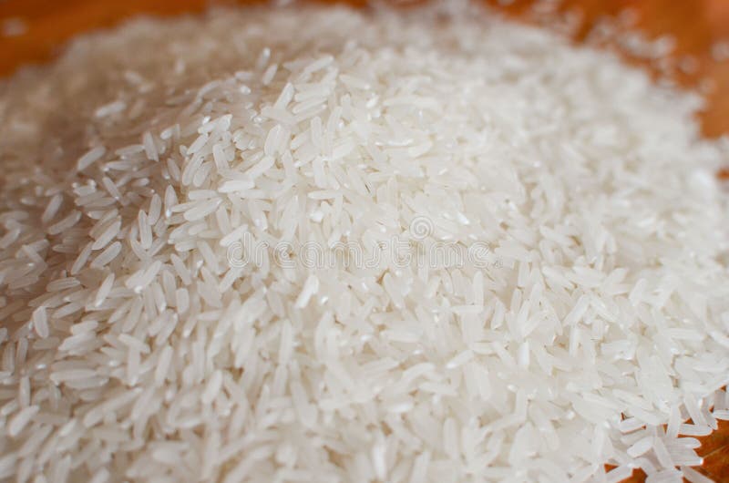 Uncooked Asian White Rice or Long White Rice Grain As Background Stock ...