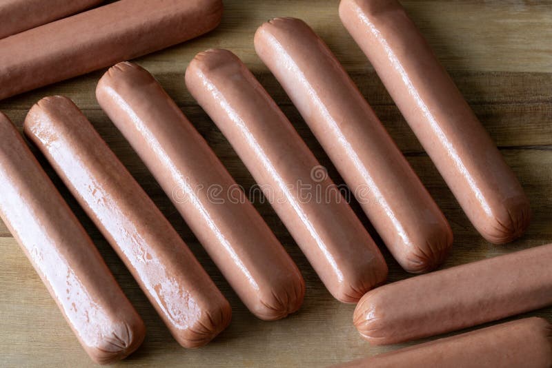 Uncooked Beef Franks on a Cutting Board Stock Photo - Image of beef ...