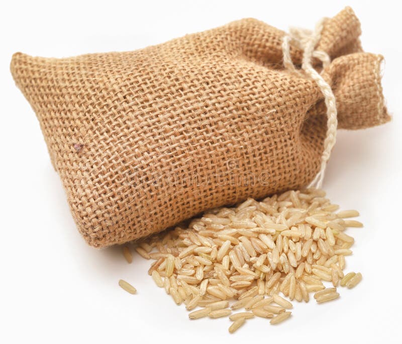Uncooked brown rice stock image. Image of dietary, scoop - 245978307