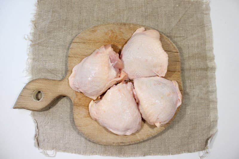 Uncooked chicken thighs stock photo. Image of food, poultry - 51375246