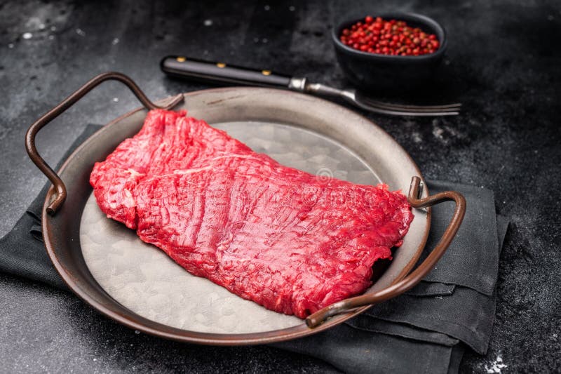 Uncooked Flank Steak, Raw Beef Flap Meat Steak. Black Background Stock ...