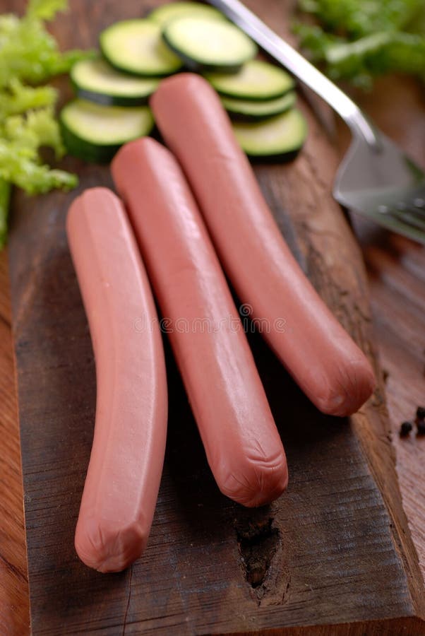 Uncooked Frankfurters with Fresh Vegetables Stock Photo - Image of ...