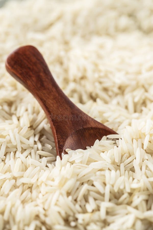 Uncooked indian long rice stock image. Image of rice - 166997141