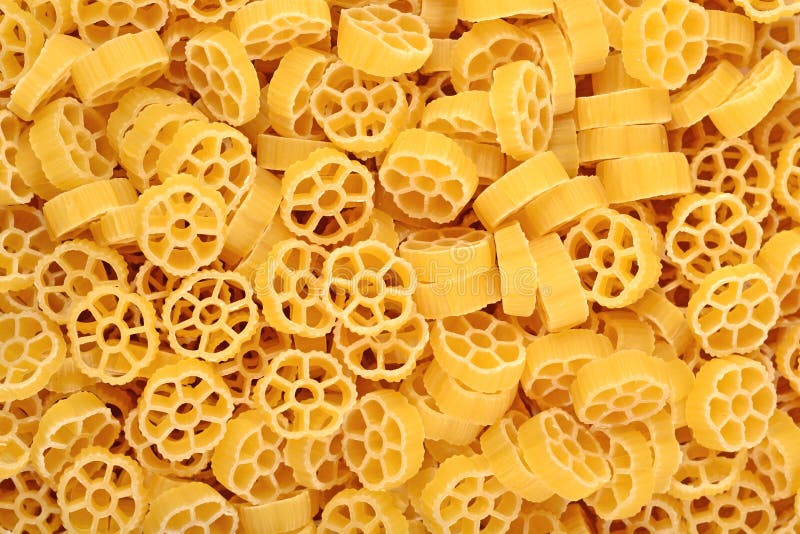 Raw Uncooked Rotelle Dry Italian Pasta. Ruote, Wagon Wheel Shape Stock ...