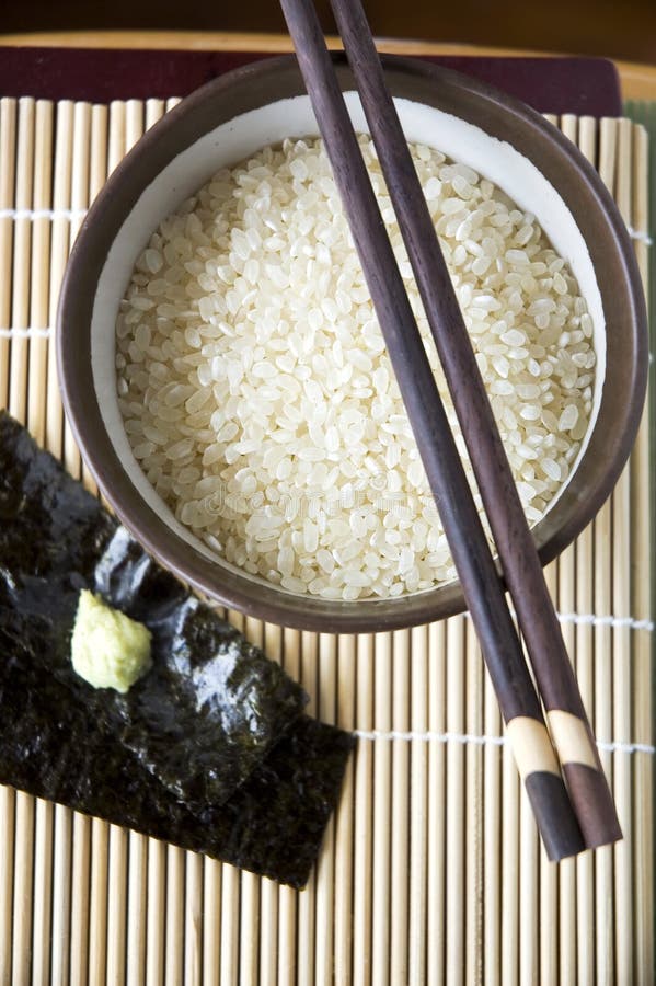 Uncooked japanese rice in bowl - Stock Image - Everypixel