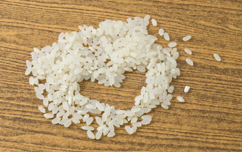 Uncooked Japanese Rice in a Heart Shape Stock Photo - Image of love ...