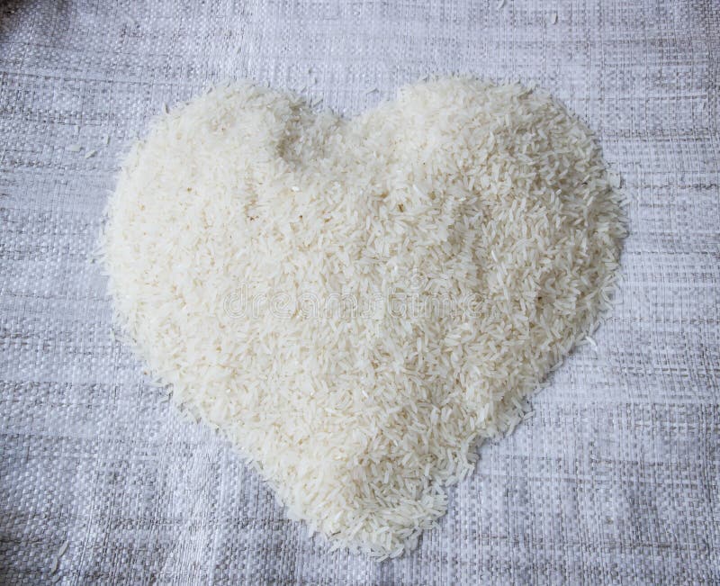 Uncooked jasmine rice stock image. Image of diet, heap - 40608303
