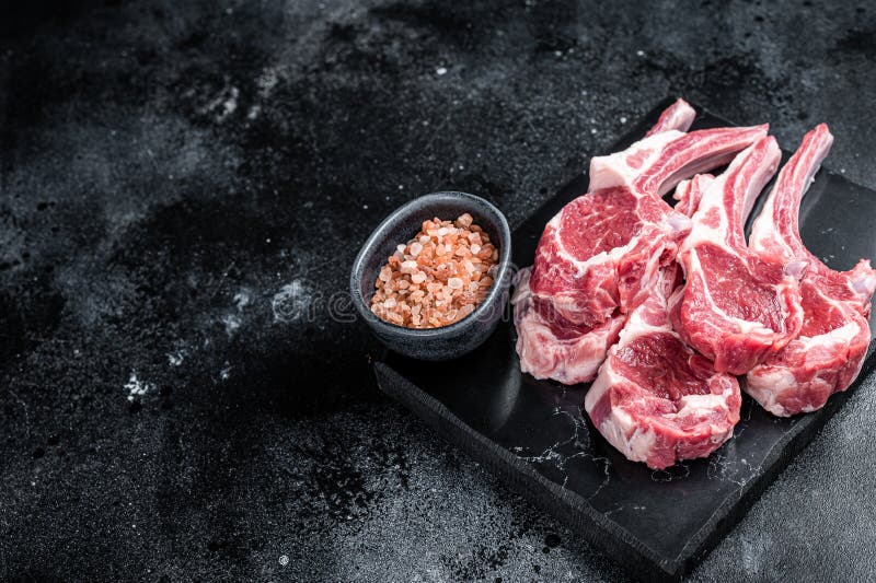 Raw Uncooked Lamb Mutton Meat Chops Steaks with Thyme and Garlic ...