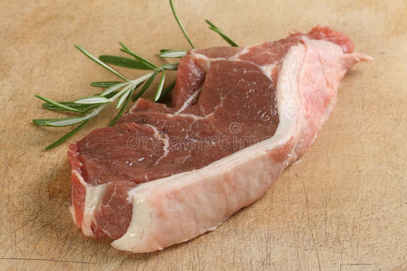 Uncooked lamb steak stock photo. Image of rosemary, food - 58979308