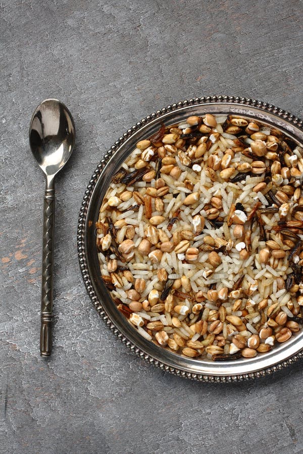 Uncooked Multigrain Rice in Metal Plate on Wooden Background Stock ...