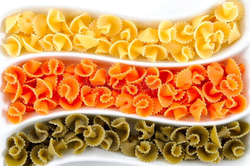 Uncooked pasta in a bowl stock photo. Image of apulia - 27755132