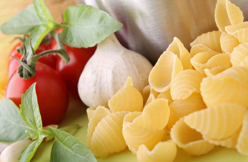 Uncooked Pasta and Ingredient Stock Image - Image of tomato, cereals ...