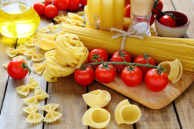 Uncooked Pasta on Wooden Table Stock Image - Image of italy, noodle ...