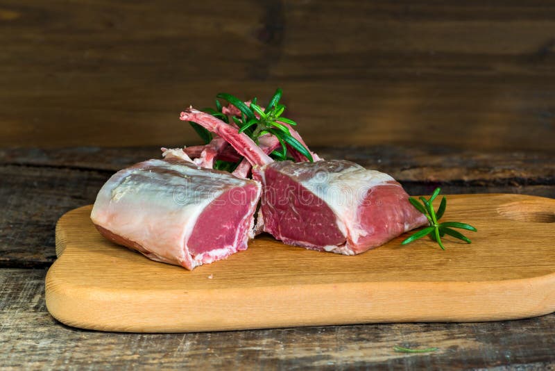 Uncooked Rack of Lamb with Rosemary Stock Photo - Image of barbecue ...