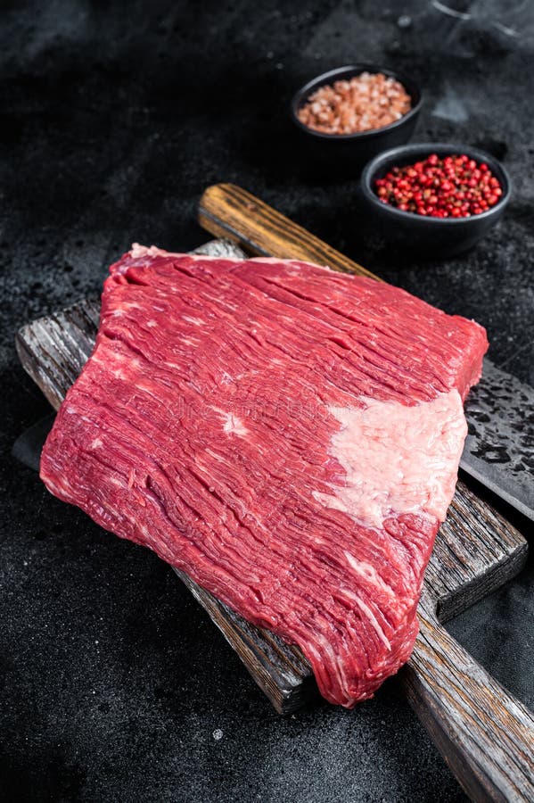 Uncooked Raw Beef Brisket Meat on Butcher Board. Black Background Stock ...