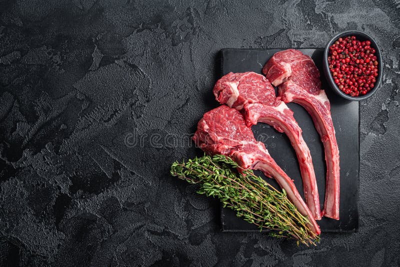 Uncooked Raw Lamb Chop Steak, Mutton Cutlet on Marble Board. Black ...