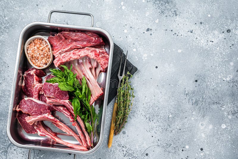 Uncooked Raw Lamb, Mutton Chops in a Steel Kitchen Tray. Gray ...