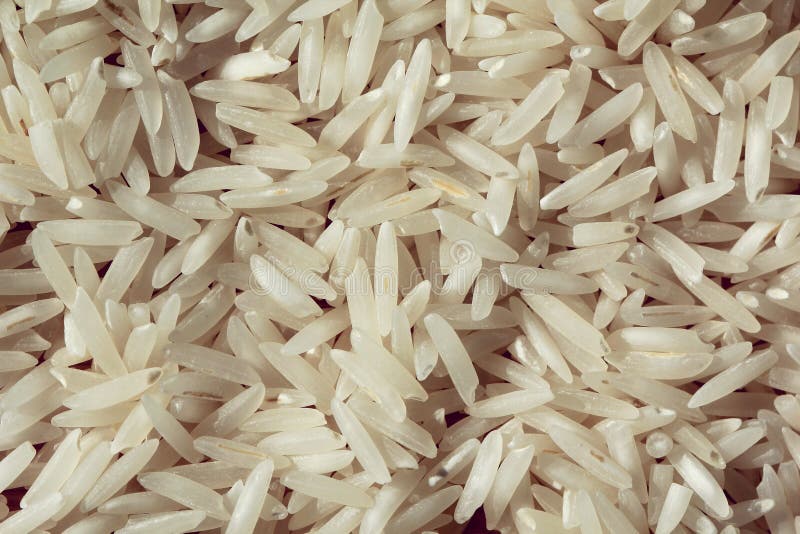 Uncooked Raw Rice Background on Wood Texture Stock Photo - Image of ...