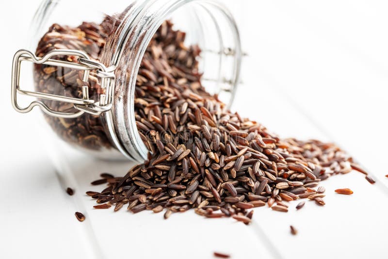 Uncooked Red Rice. Raw Wild Rice Stock Photo - Image of food, seed ...