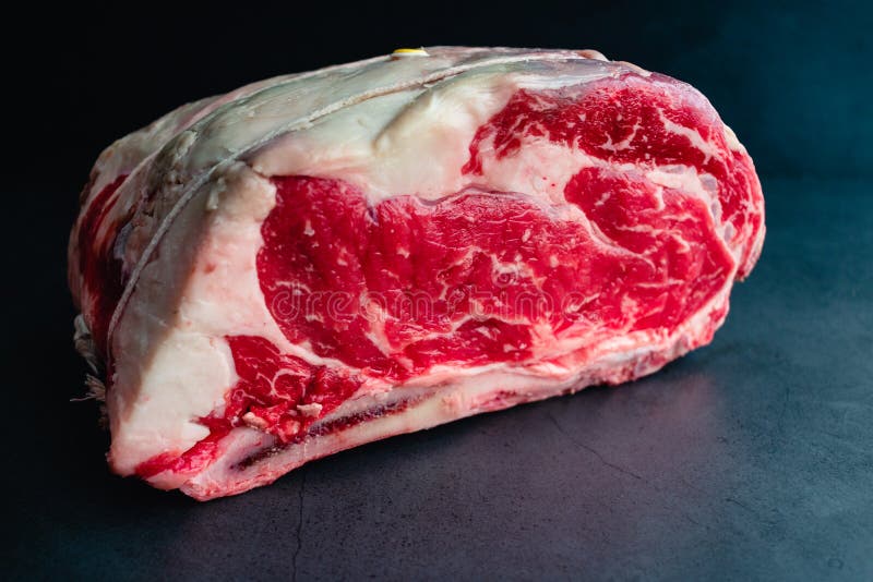 Raw Bone-in Standing Prime Rib Roast Stock Photo - Image of cooking ...