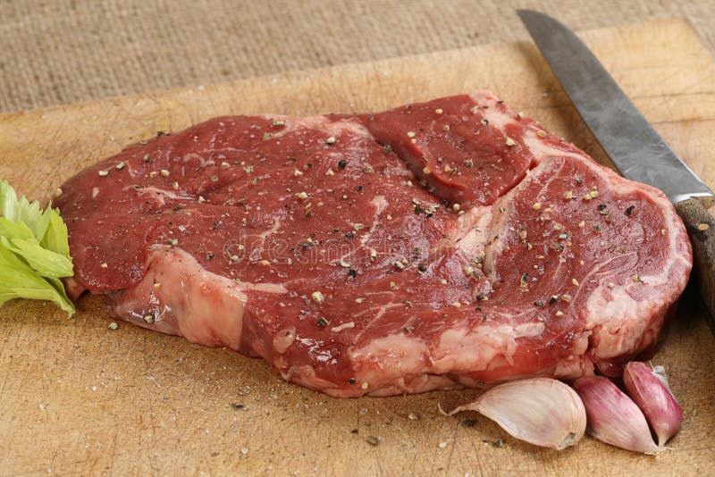Uncooked ribeye steak stock image. Image of food, seasoning - 86117403