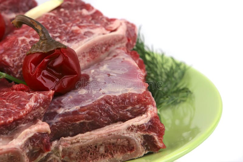 Uncooked ribs on dish stock photo. Image of appetizers - 9956738