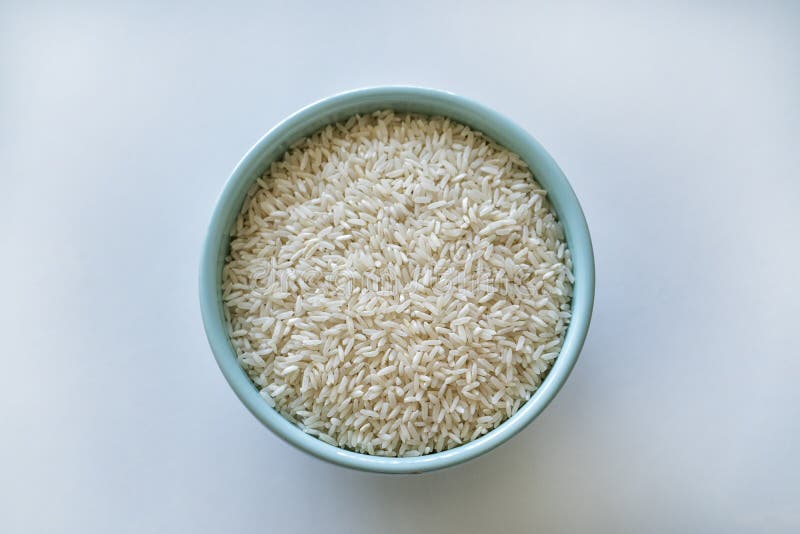 Uncooked Rice in a Blue Bowl Stock Image - Image of agriculture, long ...
