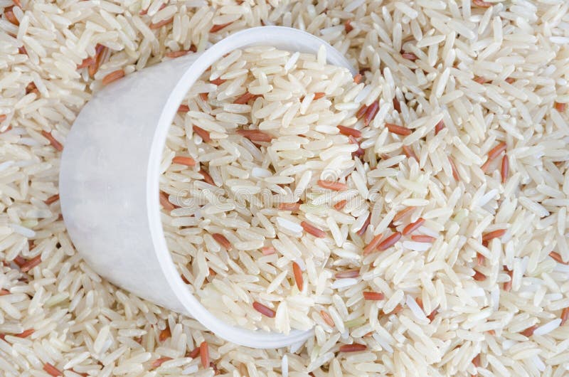 Uncooked Rice in the Cup Background Stock Image - Image of ceramic ...