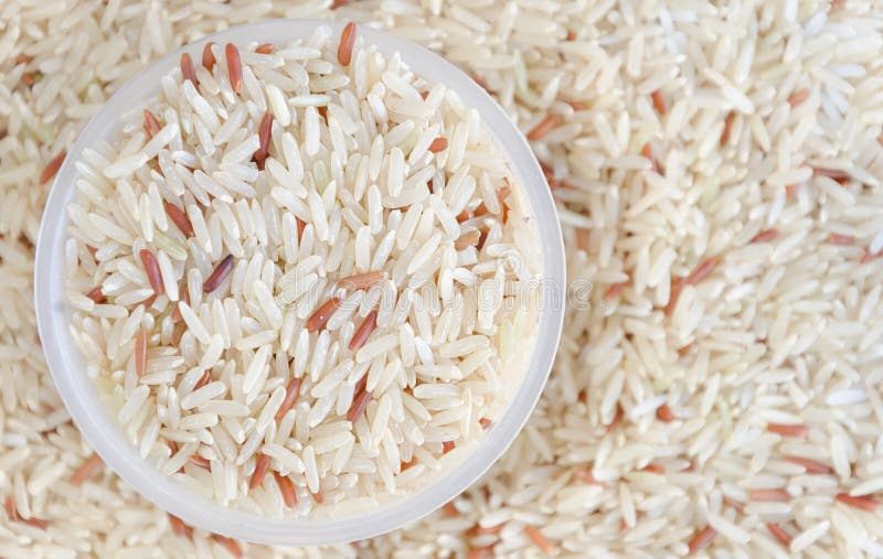 Uncooked Rice in the Cup Background Stock Photo - Image of food ...