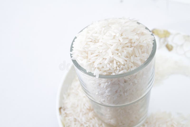 Uncooked rice in a glass stock image. Image of rice, background - 48320125