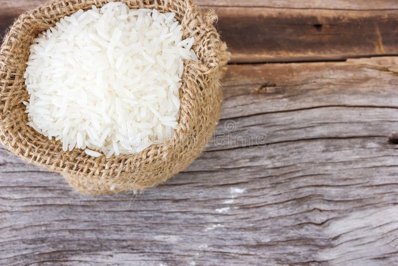 Uncooked Rice in a Small Burlap Sack. White Rice. Stock Photo - Image ...