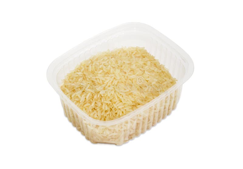 Uncooked Rice in the Small Plastic Container Stock Image - Image of ...