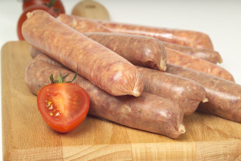 Uncooked sausages stock photo. Image of cutting, cook - 25131850