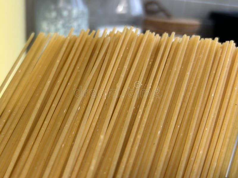 Uncooked spaghetti sticks stock image. Image of italian - 378408303