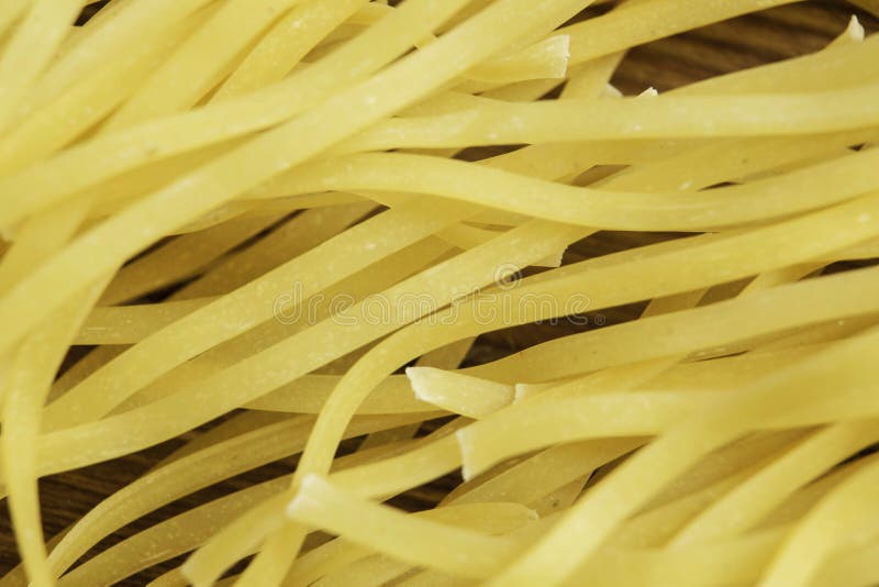 Uncooked Spaghetti on Table Stock Image - Image of delicious, food ...