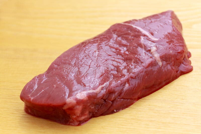Uncooked Steaks On Wooden Cutting Board Stock Photo - Image of dinner ...