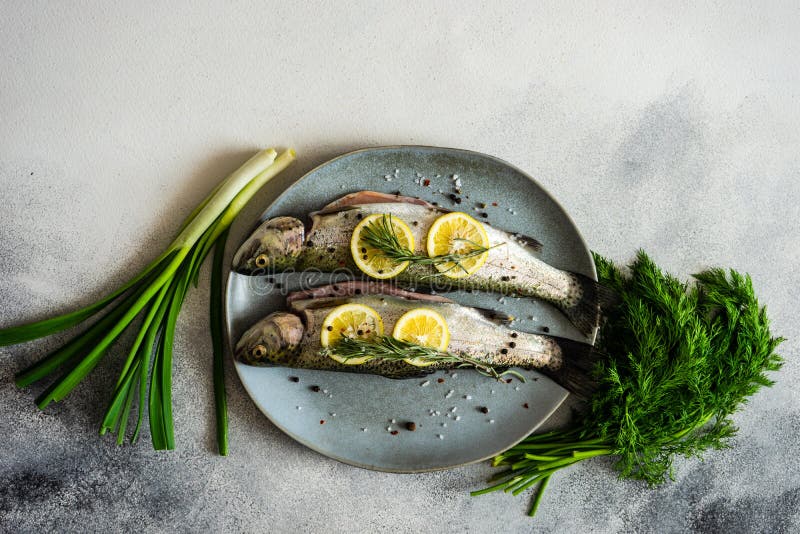 Uncooked trout fish stock photo. Image of background - 174098140