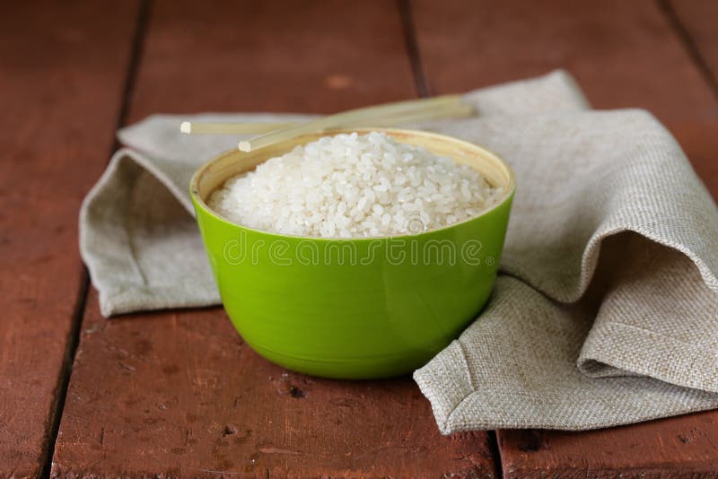 Uncooked White Rice in a Green Bowl Stock Image - Image of asian, bowl ...