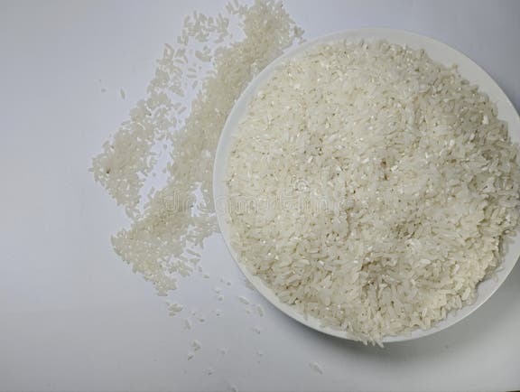 Uncooked White Rice on Plate Stock Photo - Image of produce, meal ...