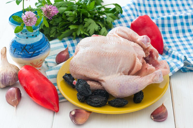 Uncooked Whole Chicken on Plate Withvegetables and Prunes Stock Image ...