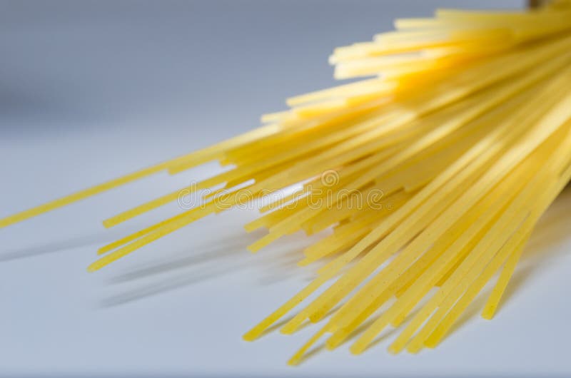 Uncooked Yellow Spaghetti in Box Stock Photo - Image of fine, flour ...