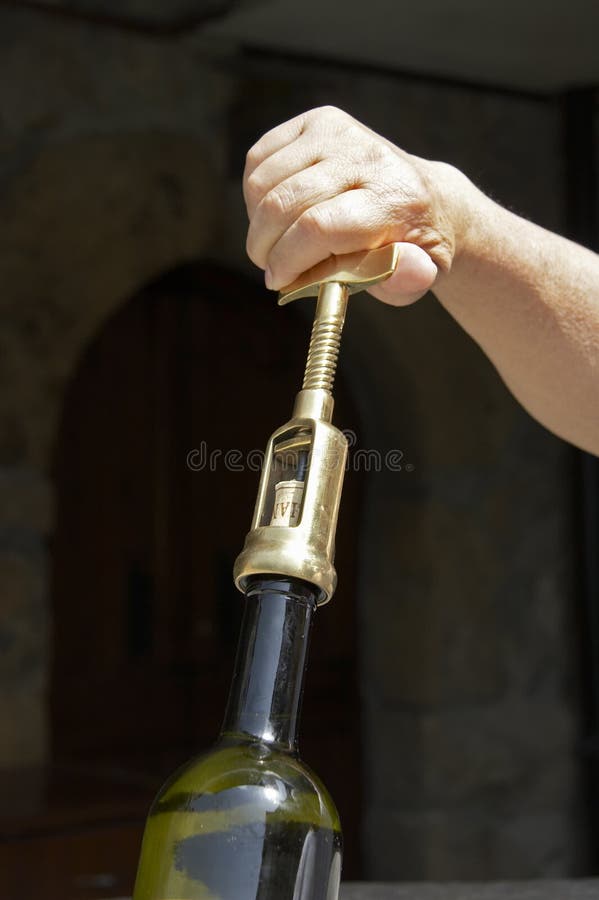 Uncorking stock photo. Image of hand, uncorking, open, bottle - 254456