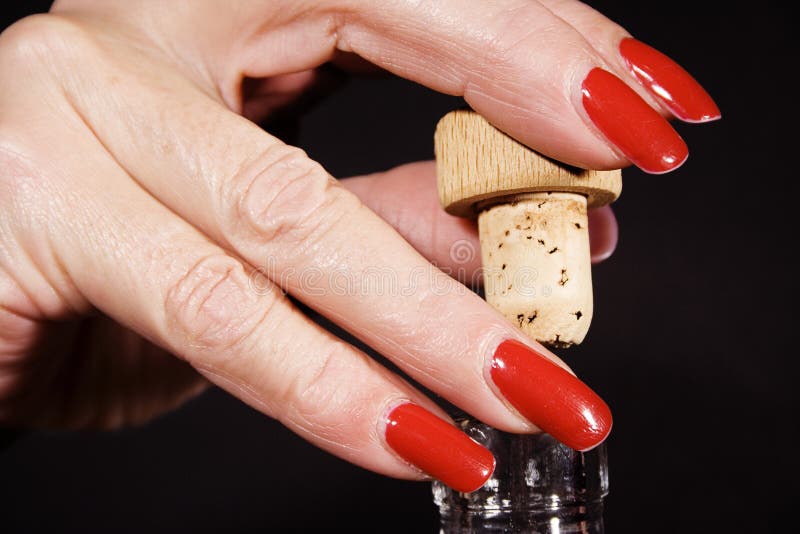 Uncorking a Wine Bottle stock image. Image of closeup, fingernails - 437457