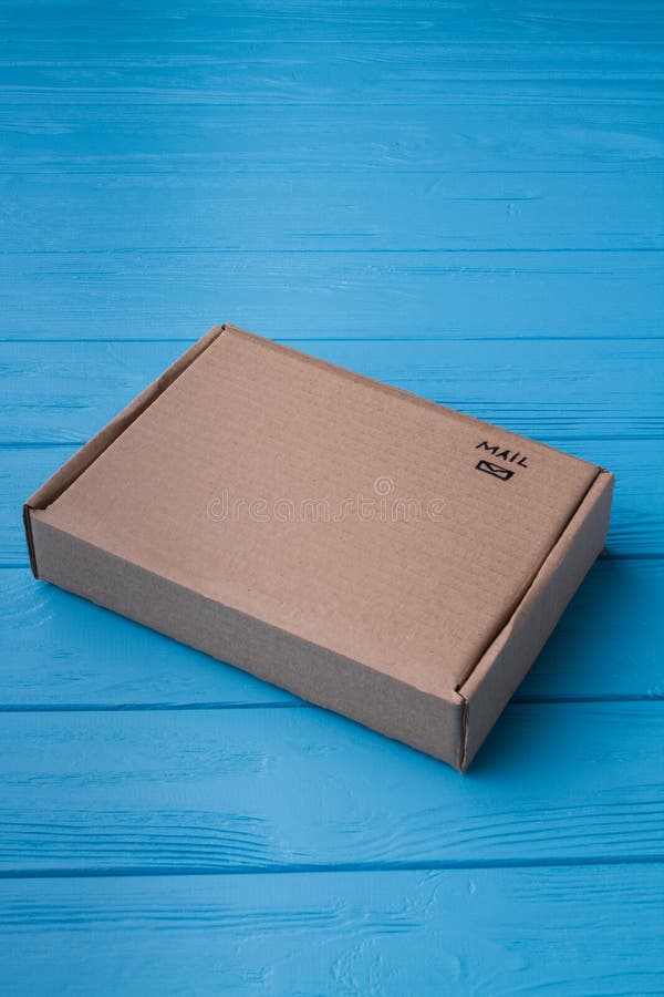 Uncovered Mail Box on Blue Surface. Stock Photo - Image of packer ...