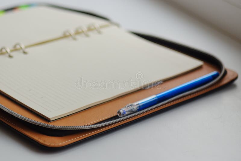 Undated Diary on Rings with Blue Pen Stock Photo - Image of book ...