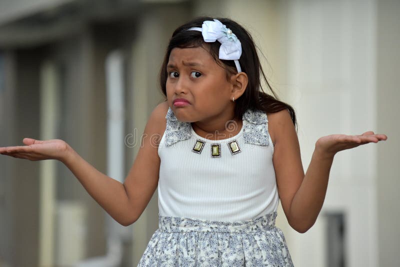 An Undecided Girl Child stock image. Image of beautiful - 136887733